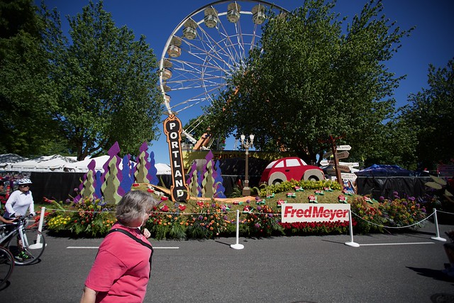 Portland Waterfront Festival: Floral Garden Display Framed by a Ferris Wheel Backdrop